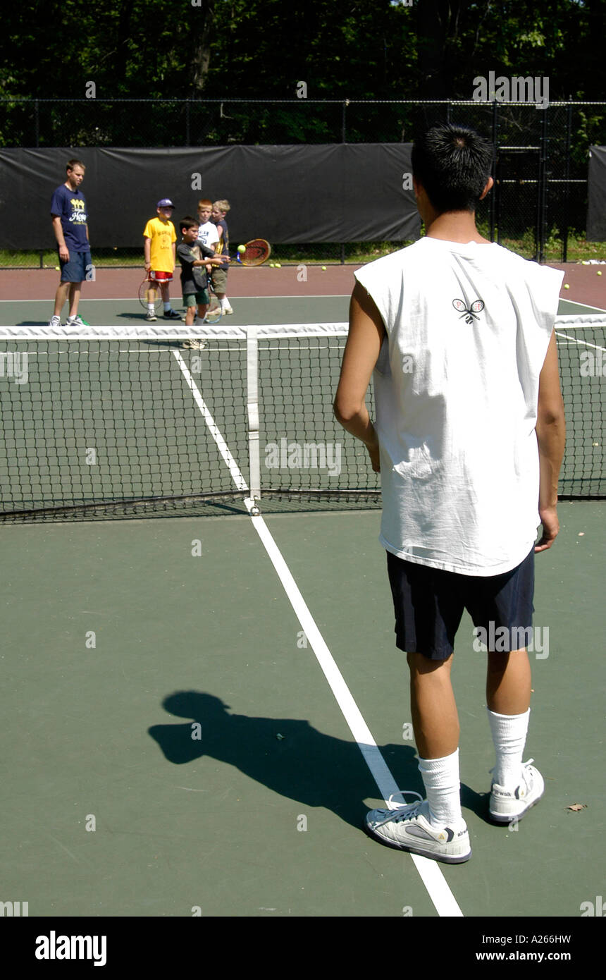 Tennis lessons are provided by a local municipality to help children ...
