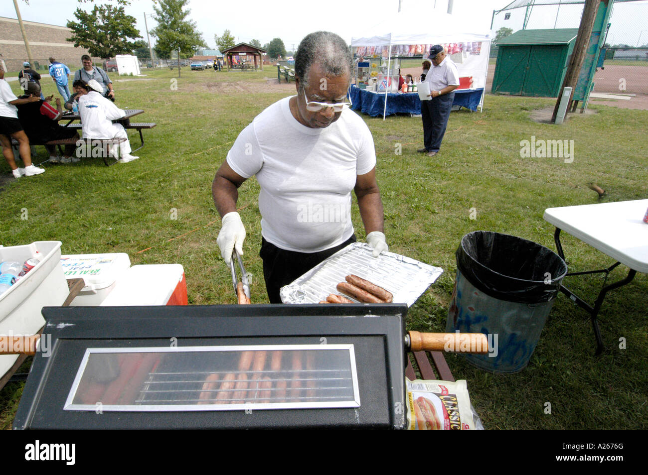 Church picnic people sharing eating hi-res stock photography and images ...