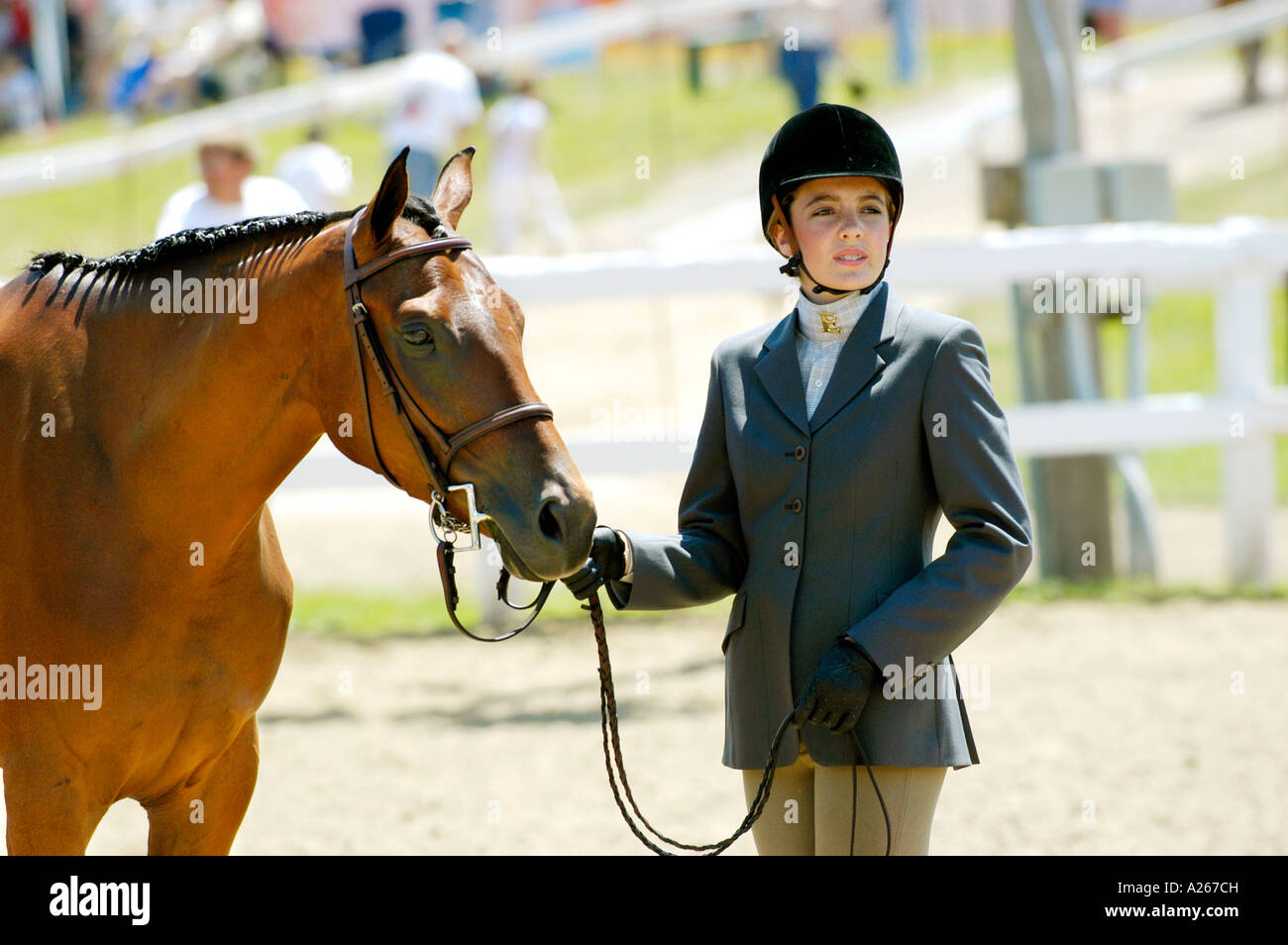 High school age female students compete in equestrian events Stock ...