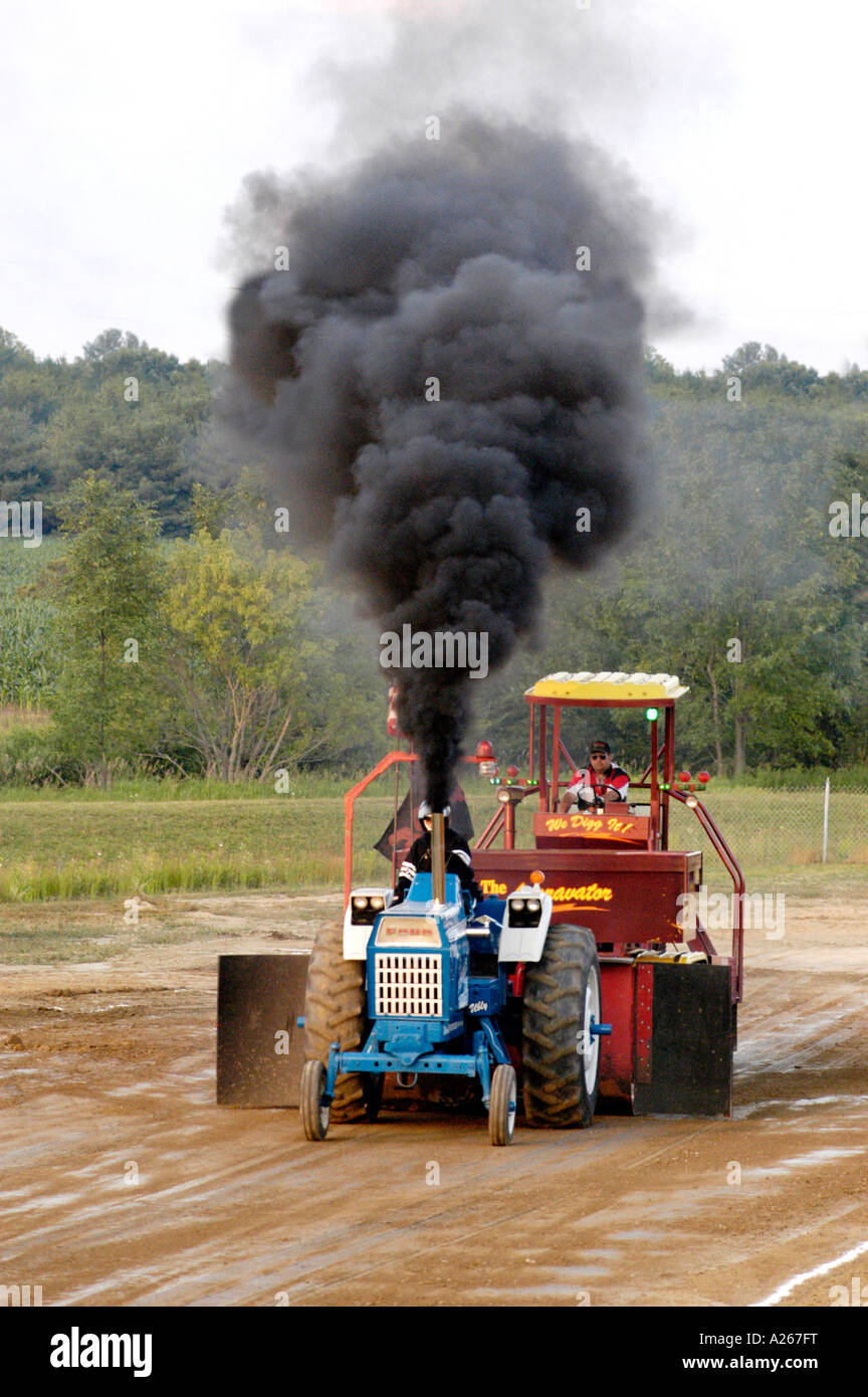Farmer participates in a tractor pull contest Stock Photo - Alamy
