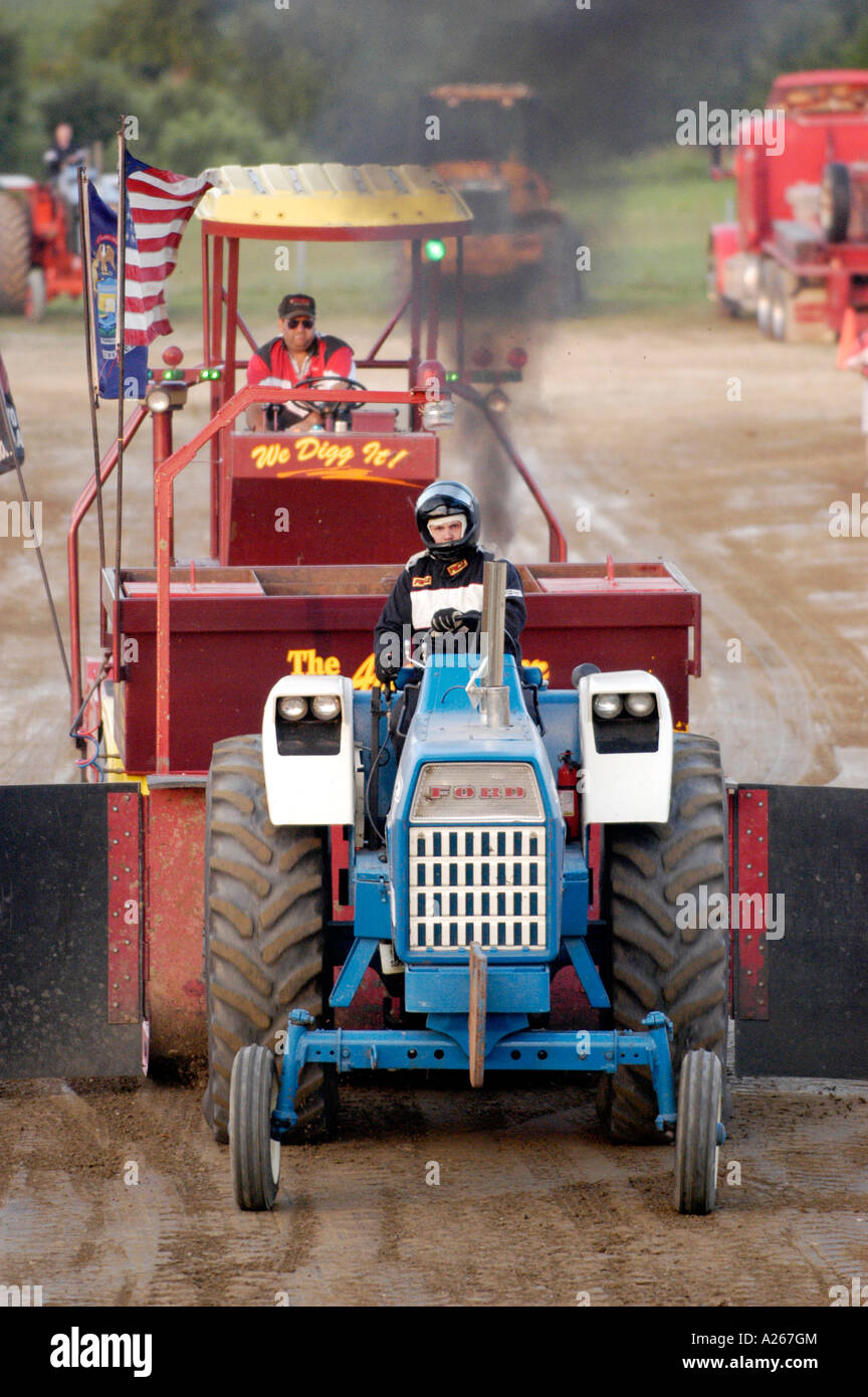 Farmer participates in a tractor pull contest Stock Photo - Alamy