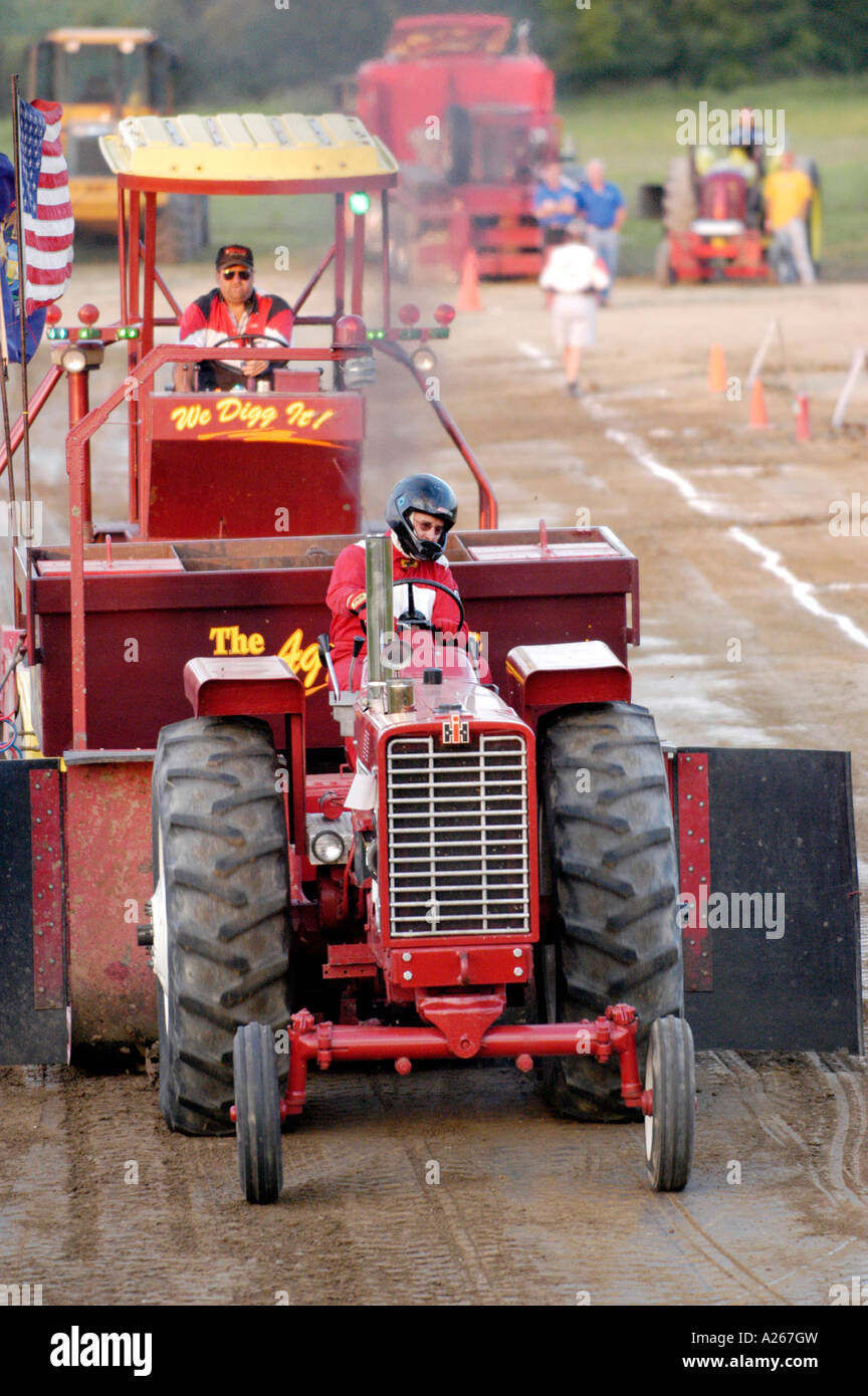 Farmer participates in a tractor pull contest Stock Photo - Alamy