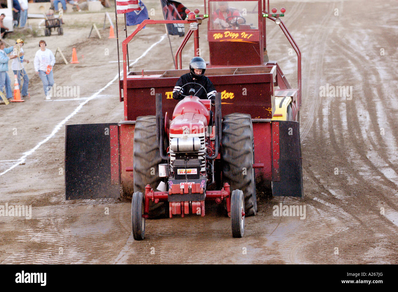 Farmer participates in a tractor pull contest Stock Photo - Alamy