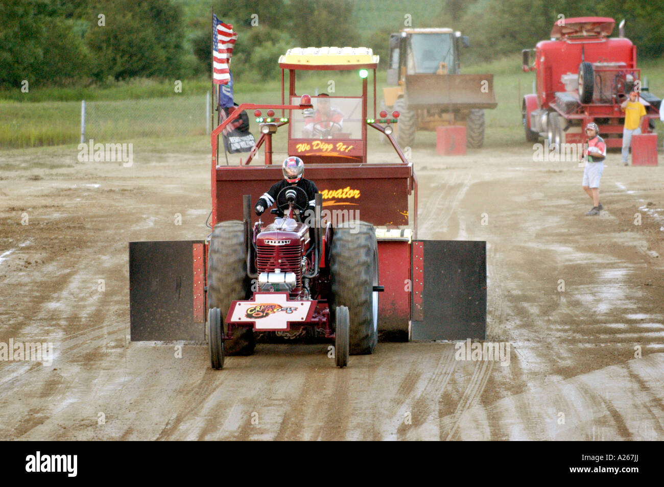 Farmer participates in a tractor pull contest Stock Photo - Alamy