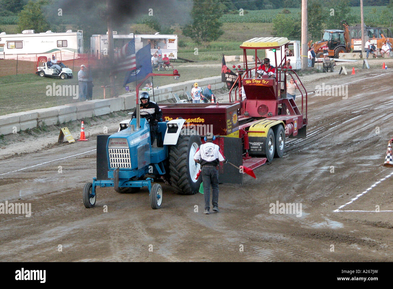 Farmer participates in a tractor pull contest Stock Photo - Alamy