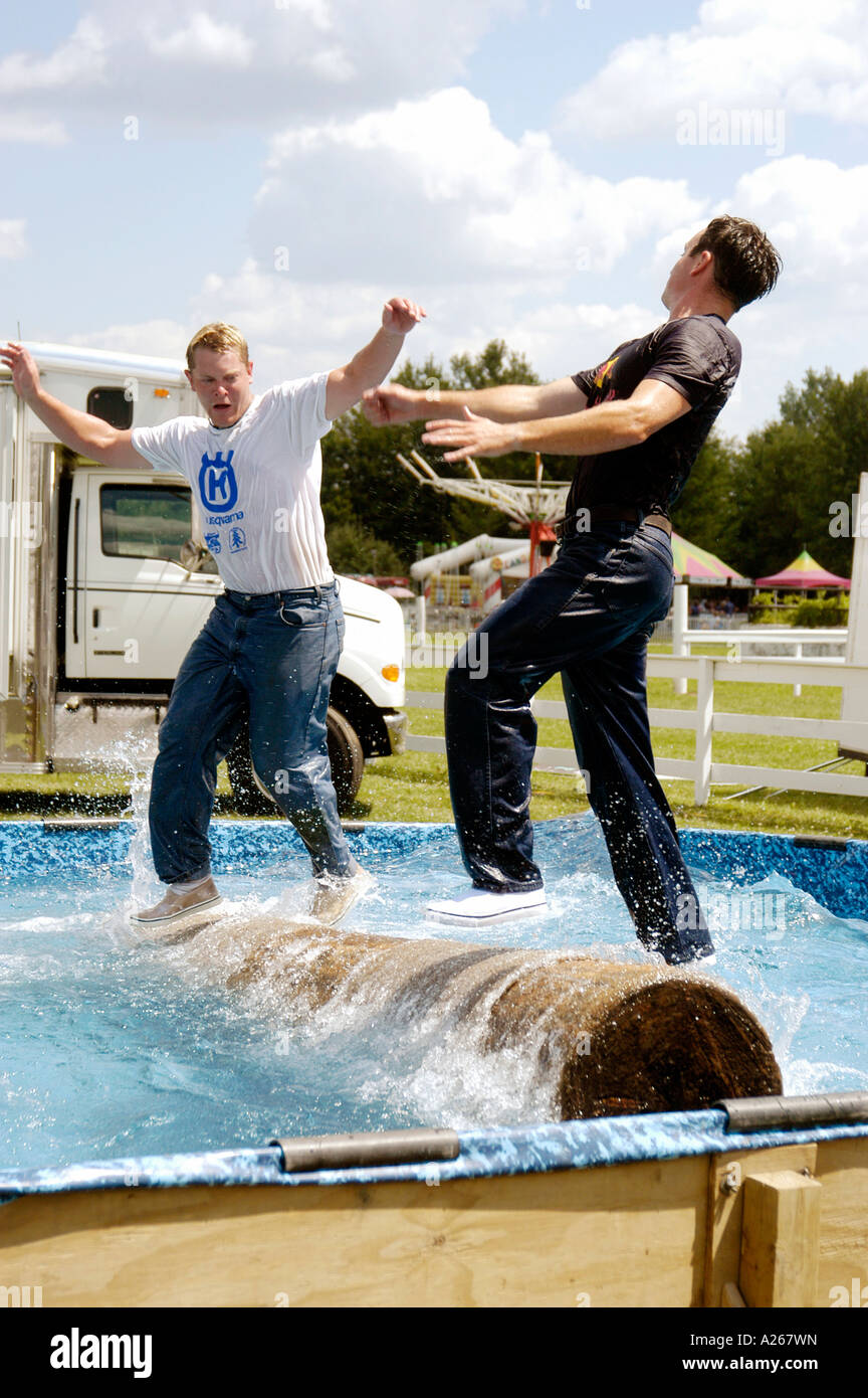 Log rolling contest Stock Photo - Alamy