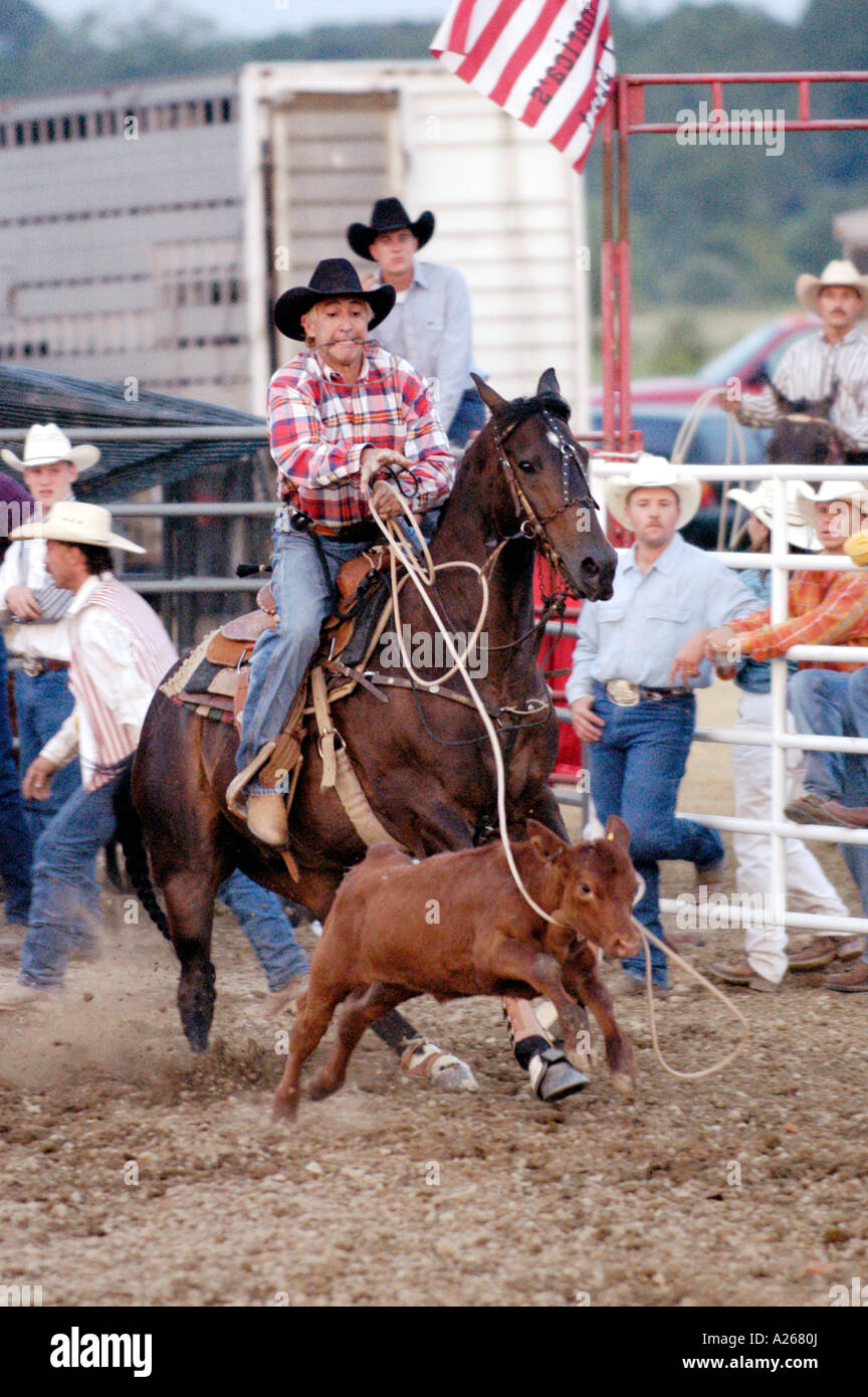 Cowboys compete in Rodeo action Stock Photo - Alamy