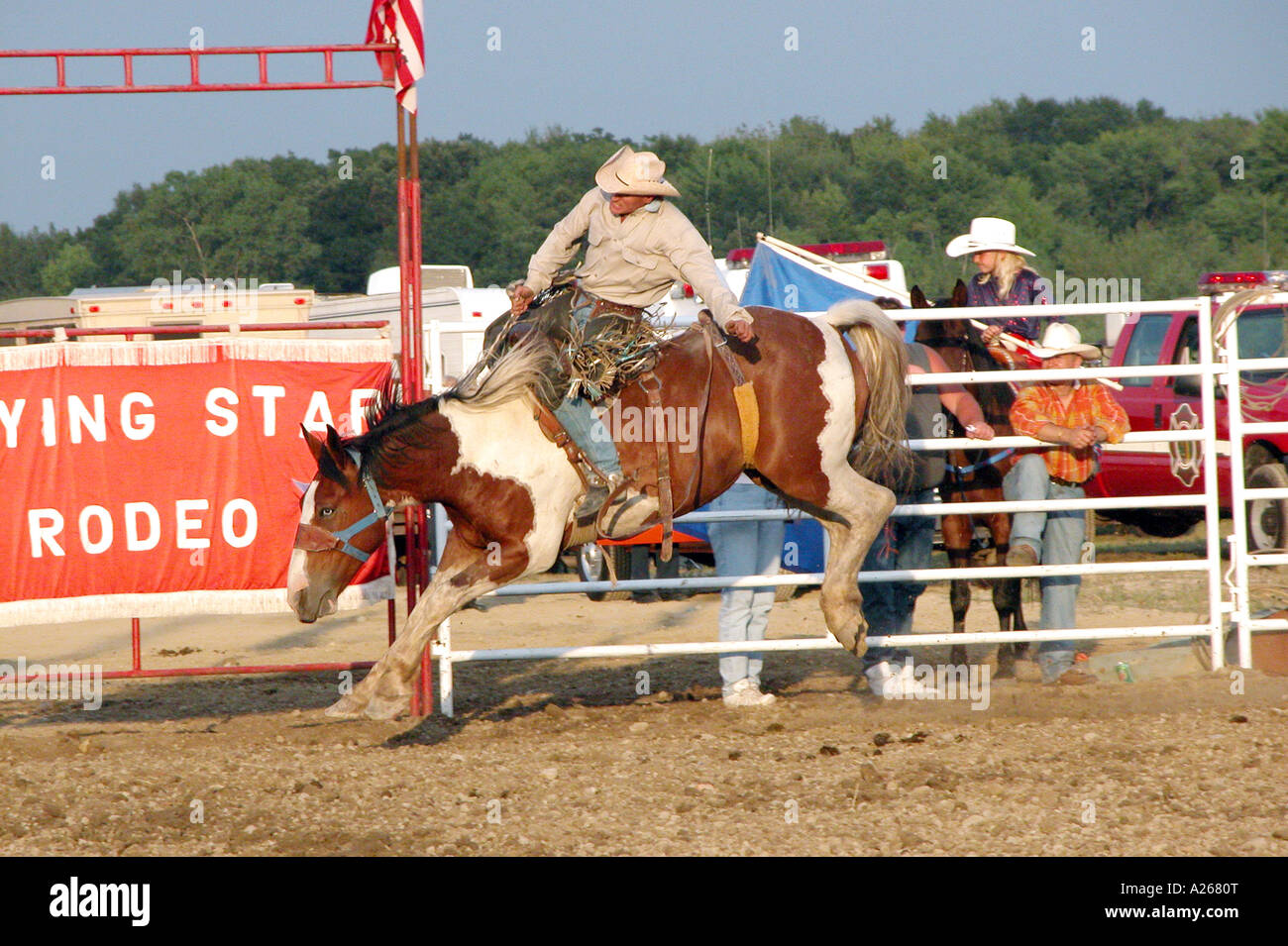 Cowboys compete in Rodeo action Stock Photo - Alamy