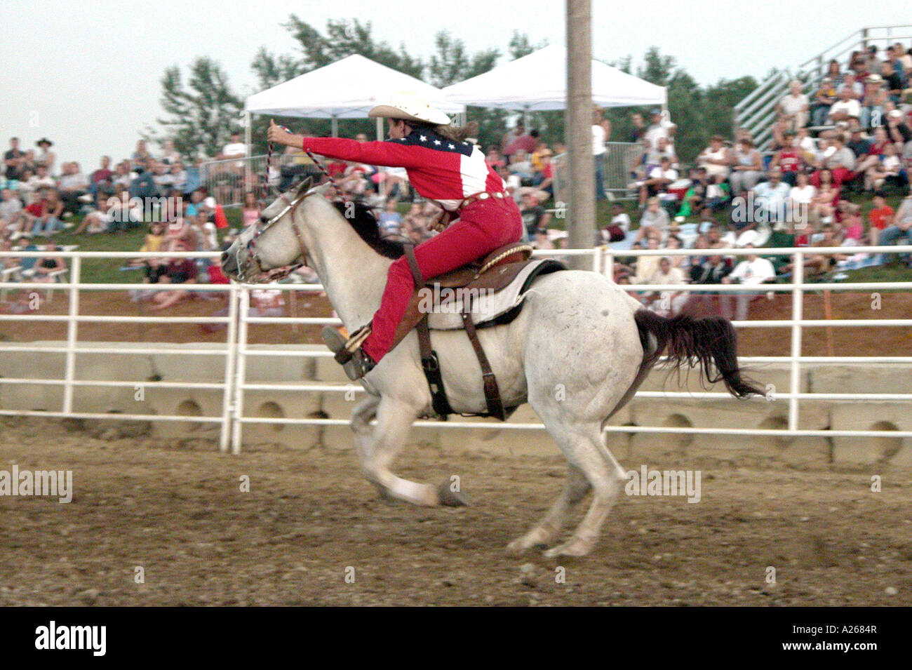 Female cowboy Compete in Rodeo Barrel Competition Stock Photo - Alamy