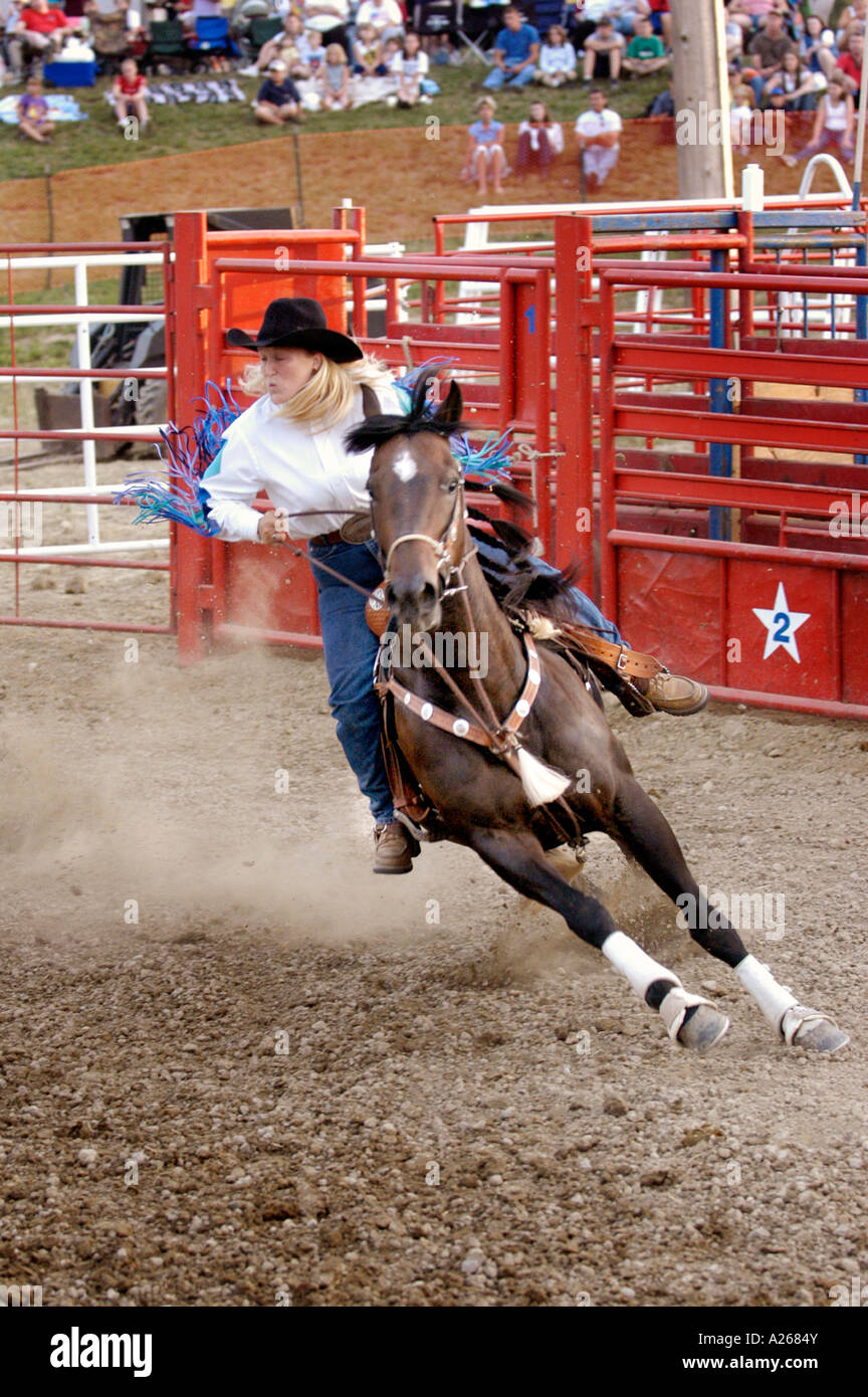 Female cowboy Compete in Rodeo Barrel Competition Stock Photo - Alamy