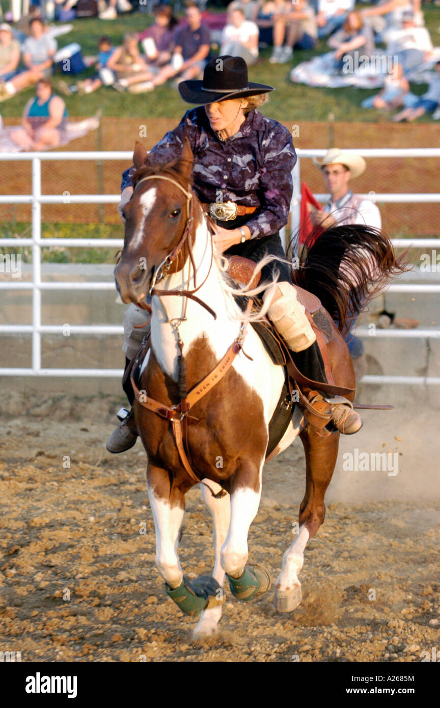 Female cowboy Compete in Rodeo Barrel Competition Stock Photo - Alamy