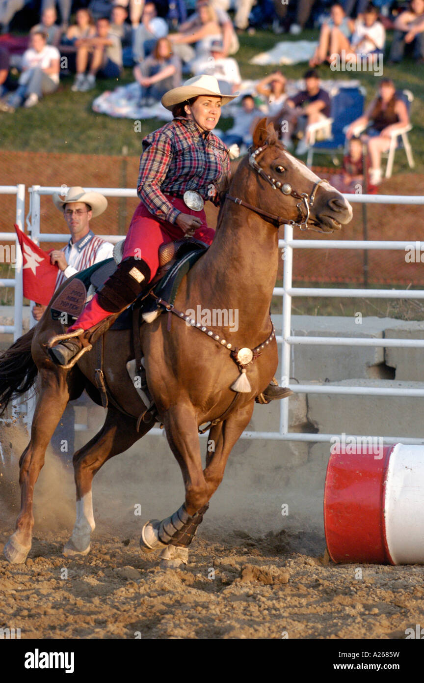 Female cowboy Compete in Rodeo Barrel Competition Stock Photo - Alamy