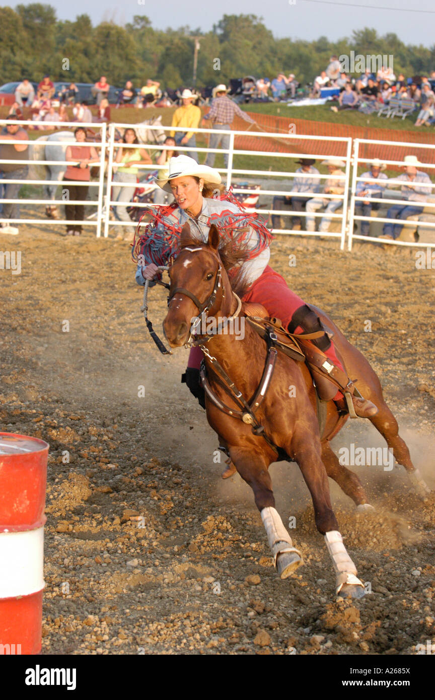 Female cowboy Compete in Rodeo Barrel Competition Stock Photo - Alamy
