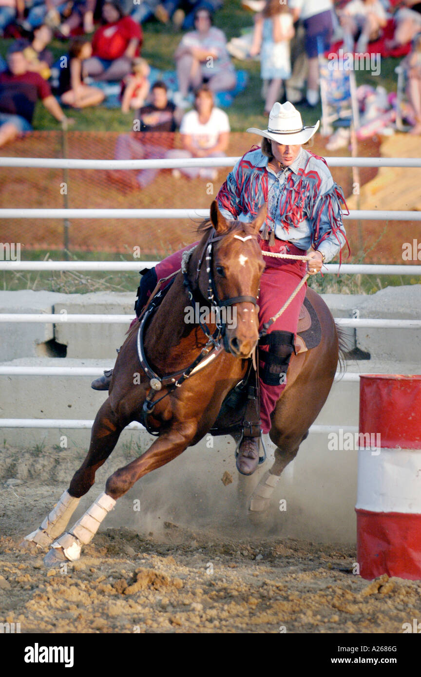 Female cowboy Compete in Rodeo Barrel Competition Stock Photo - Alamy