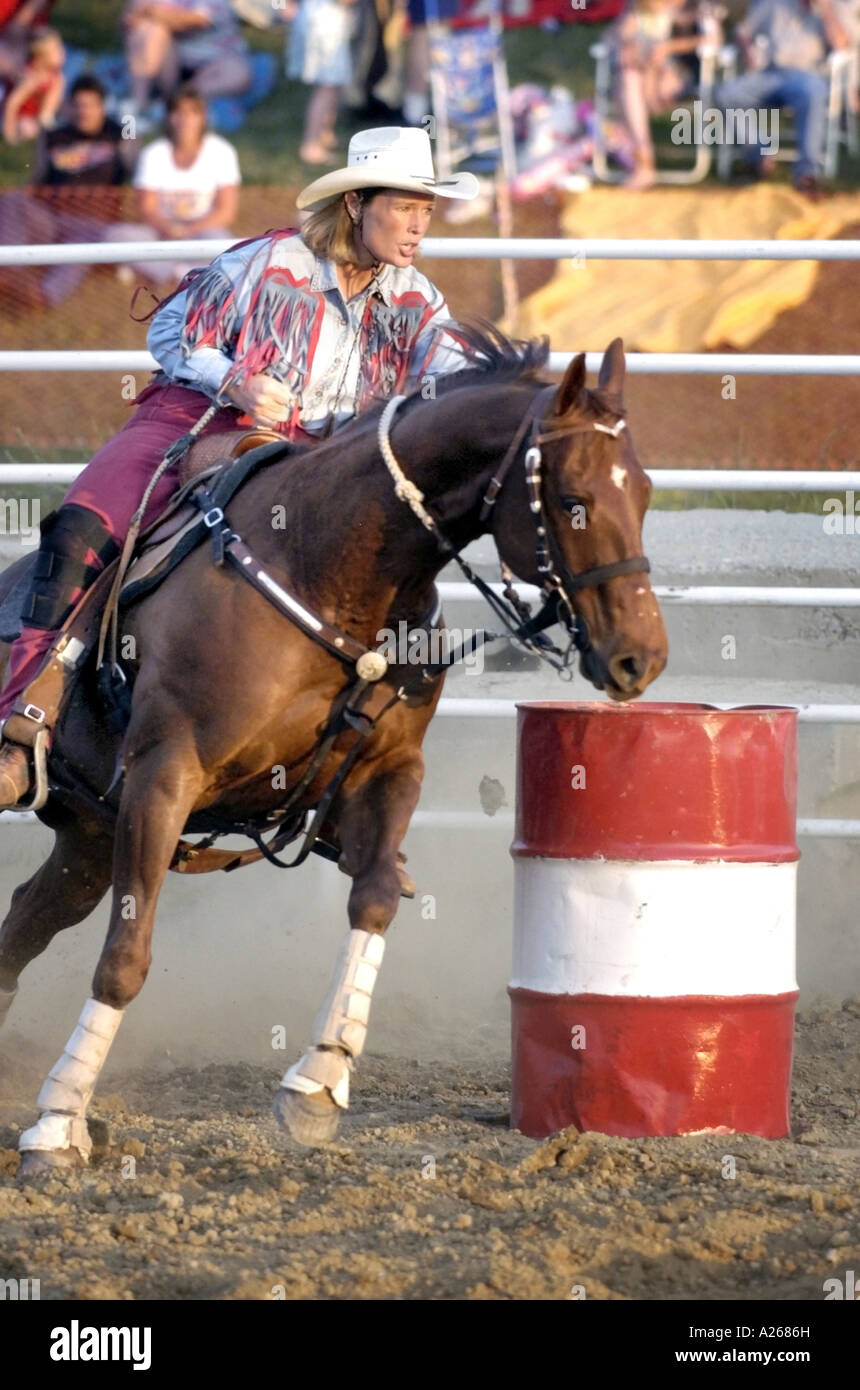 Female cowboy Compete in Rodeo Barrel Competition Stock Photo - Alamy