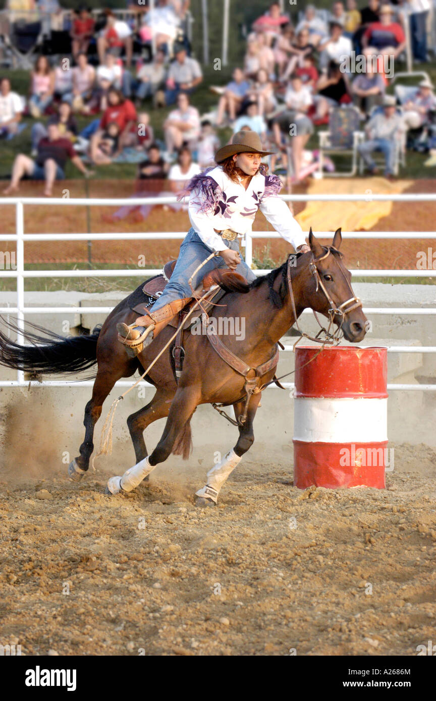Female cowboy Compete in Rodeo Barrel Competition Stock Photo - Alamy