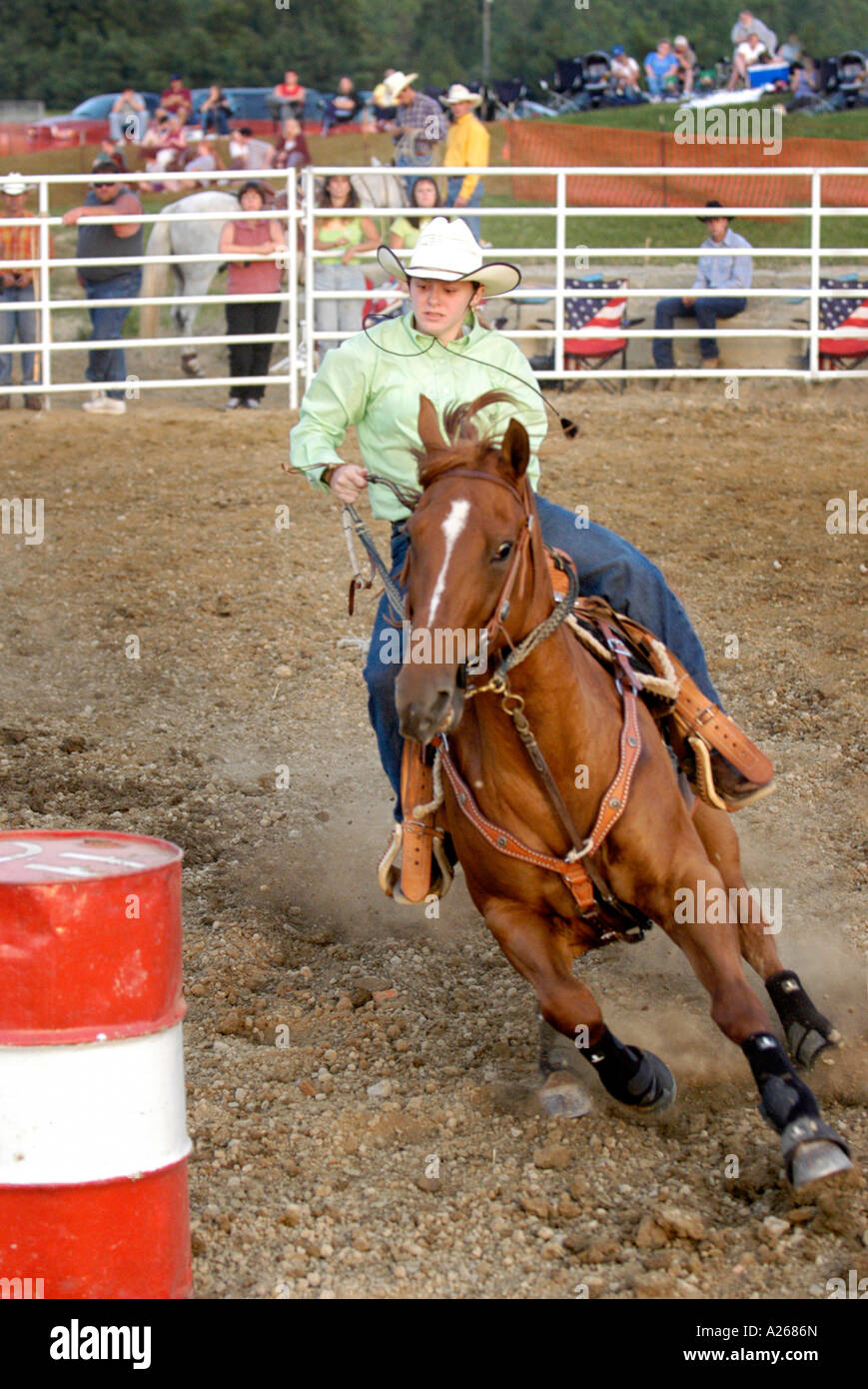 Female cowboy Compete in Rodeo Barrel Competition Stock Photo - Alamy