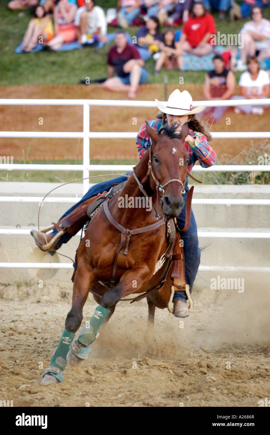 Female cowboy Compete in Rodeo Barrel Competition Stock Photo - Alamy