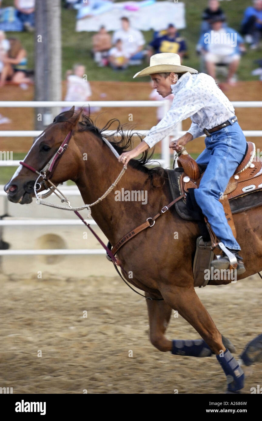 Female cowboy Compete in Rodeo Barrel Competition Stock Photo - Alamy