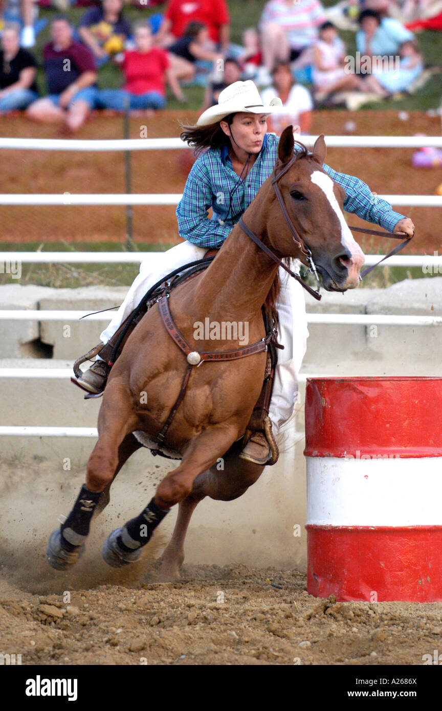 Female cowboy Compete in Rodeo Barrel Competition Stock Photo - Alamy
