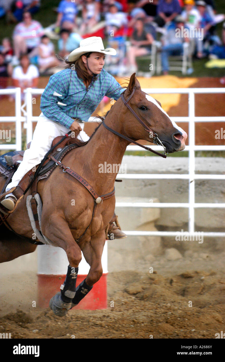 Female cowboy Compete in Rodeo Barrel Competition Stock Photo - Alamy