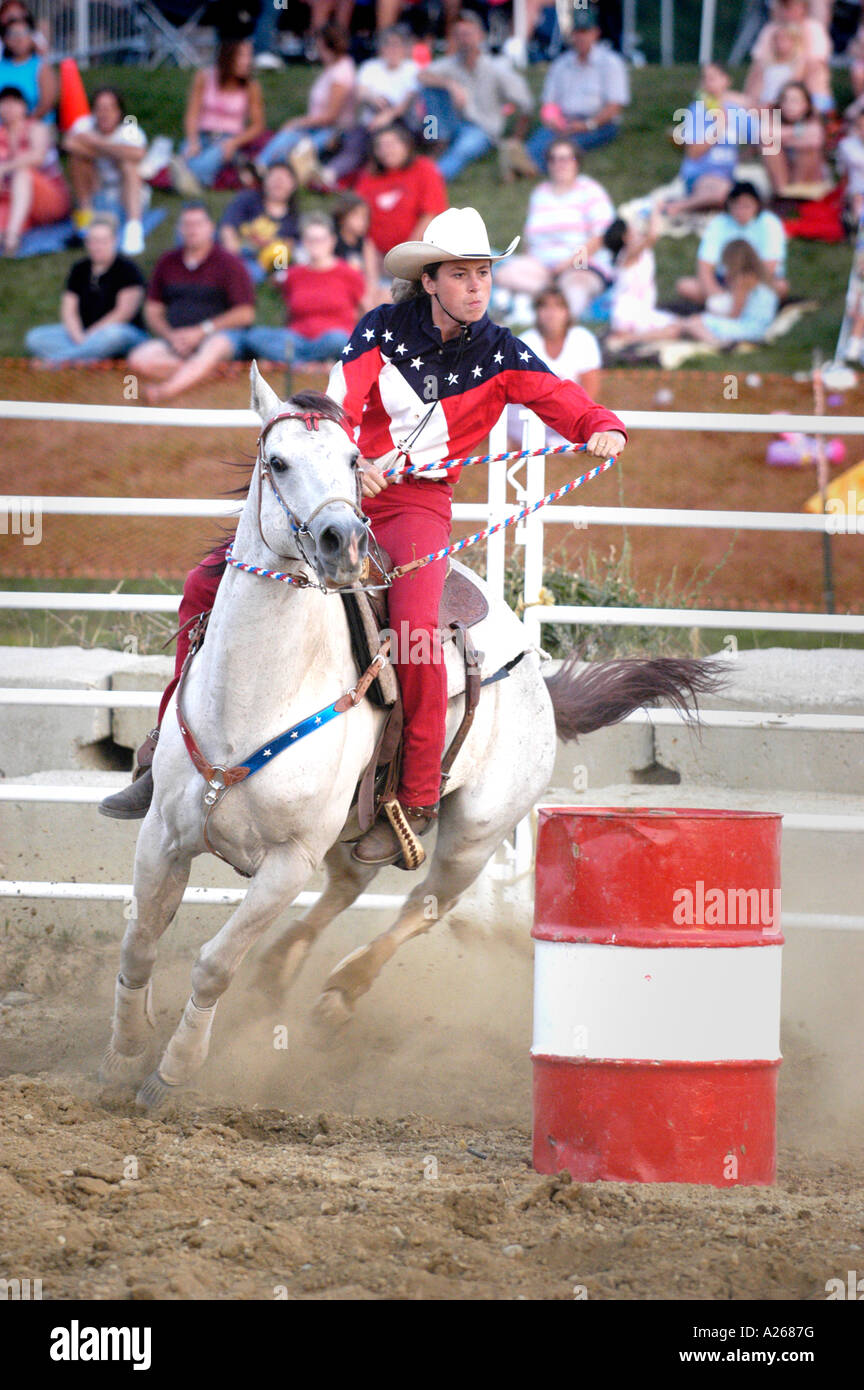 Female cowboy Compete in Rodeo Barrel Competition Stock Photo - Alamy