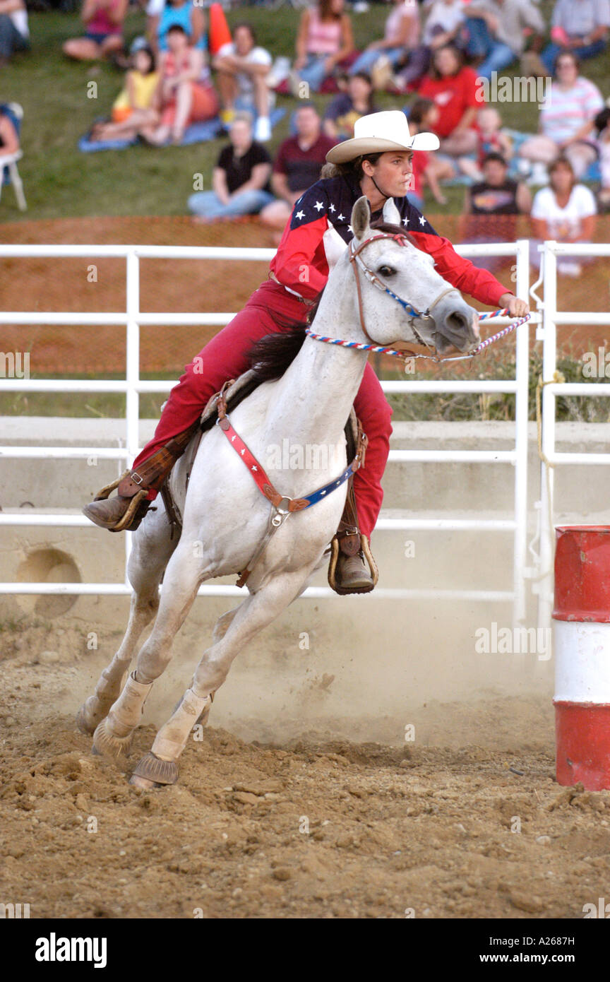Female cowboy Compete in Rodeo Barrel Competition Stock Photo - Alamy