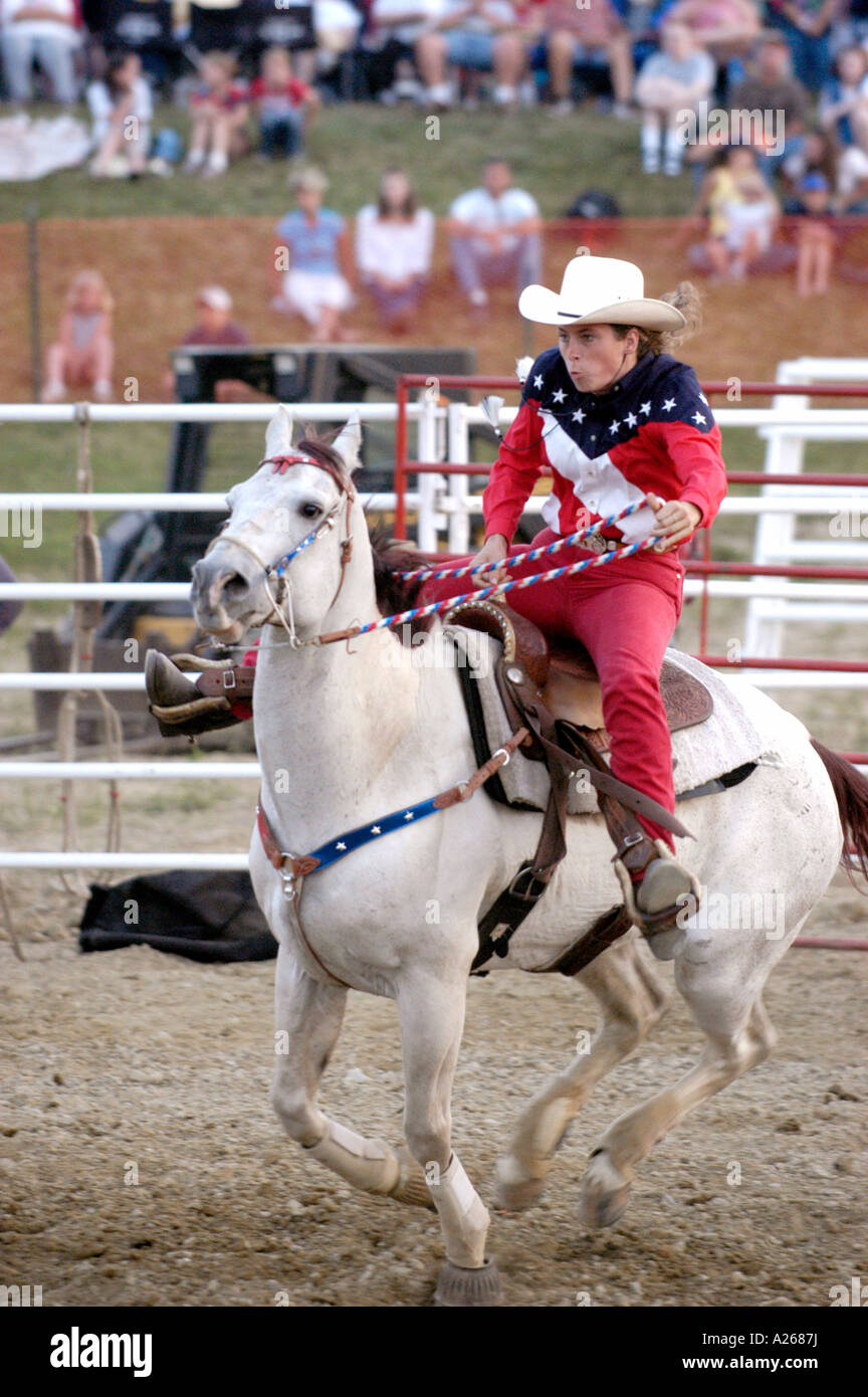 Female cowboy Compete in Rodeo Barrel Competition Stock Photo - Alamy