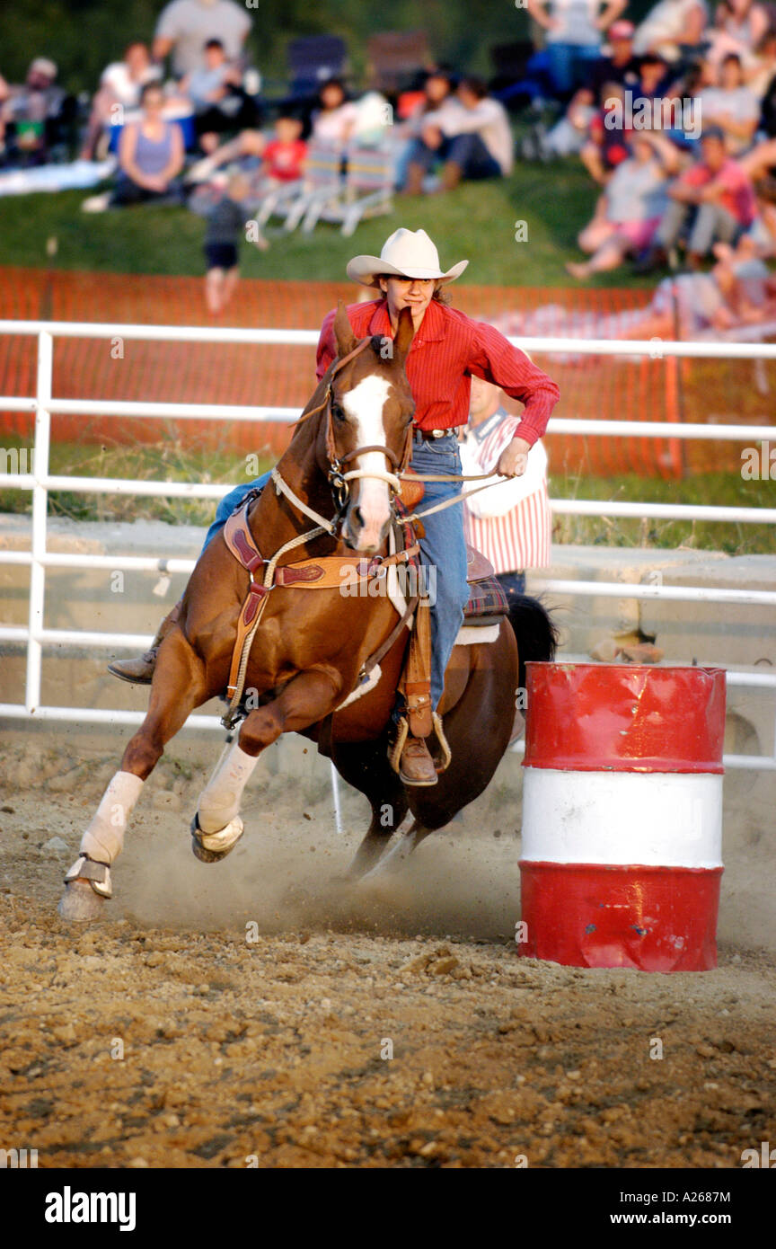 Female cowboy Compete in Rodeo Barrel Competition Stock Photo - Alamy