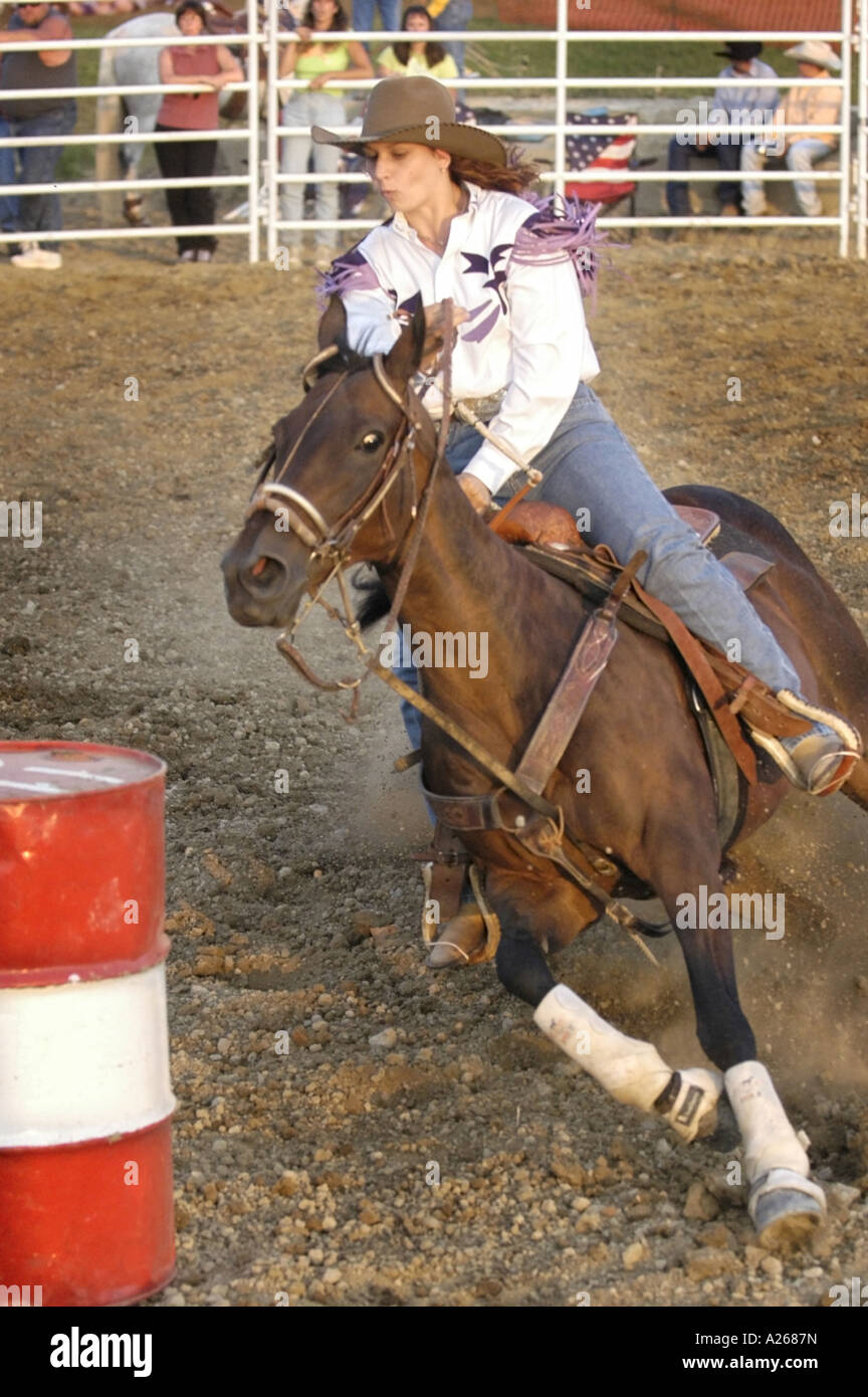Female cowboy Compete in Rodeo Barrel Competition Stock Photo - Alamy