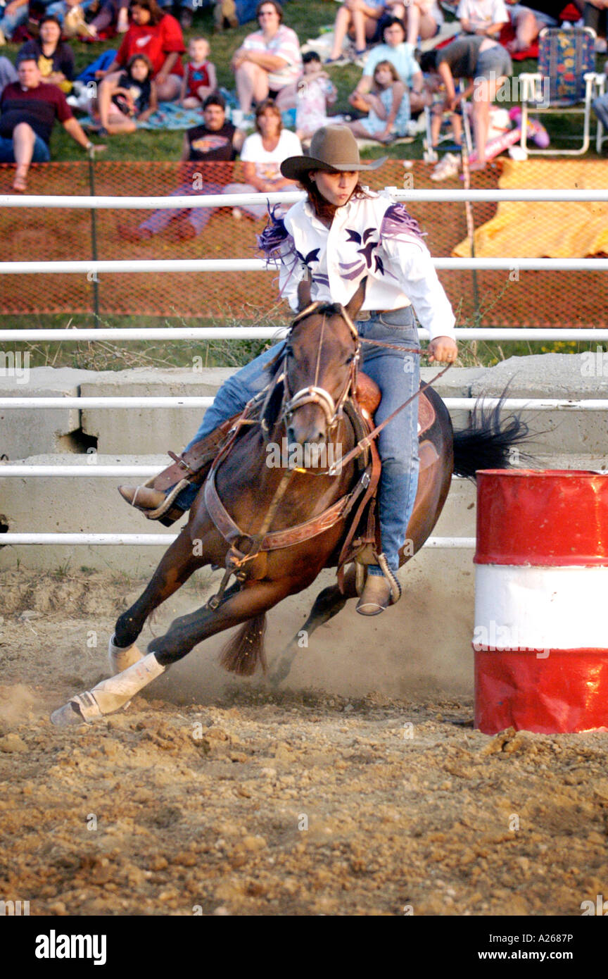 Female cowboy Compete in Rodeo Barrel Competition Stock Photo - Alamy