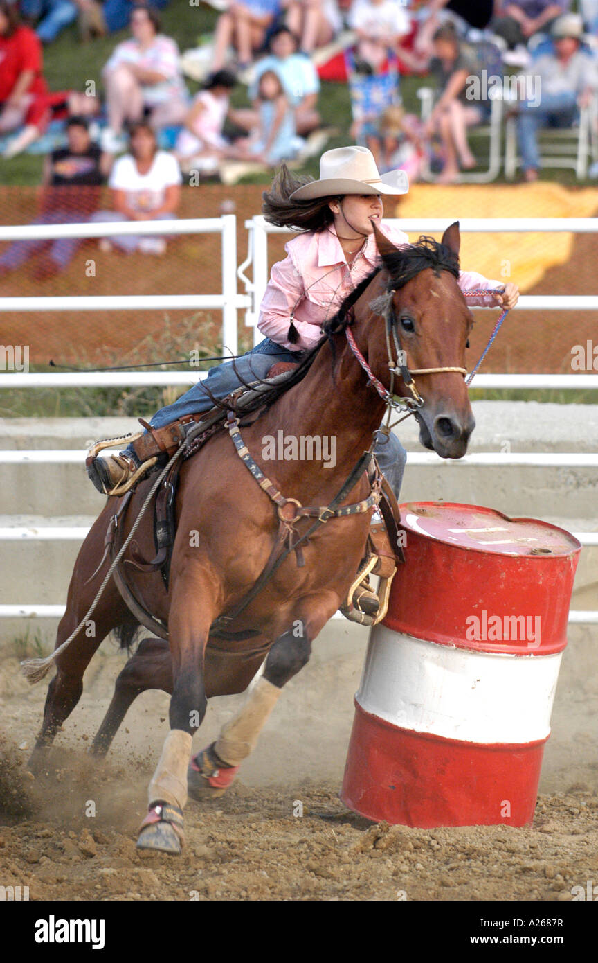 Female cowboy Compete in Rodeo Barrel Competition Stock Photo - Alamy