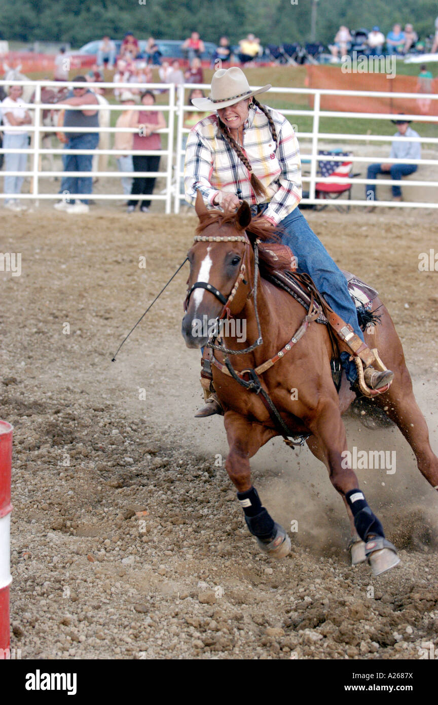 Female cowboy Compete in Rodeo Barrel Competition Stock Photo - Alamy