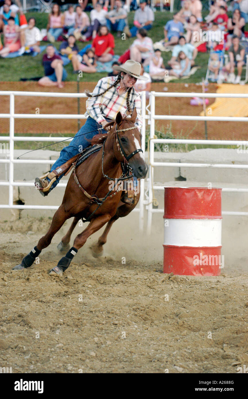 Female cowboy Compete in Rodeo Barrel Competition Stock Photo - Alamy