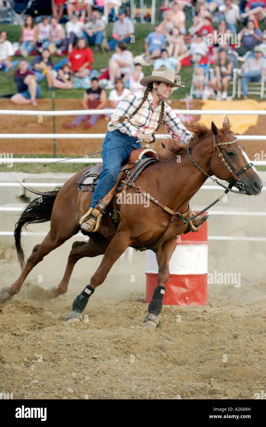 Female cowboy Compete in Rodeo Barrel Competition Stock Photo - Alamy