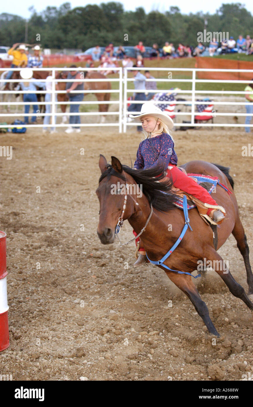 Cowboys compete in Rodeo action Stock Photo - Alamy
