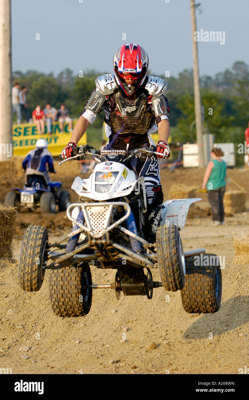ATV All Terrain Vehicles participate in off road motocross type of race ...