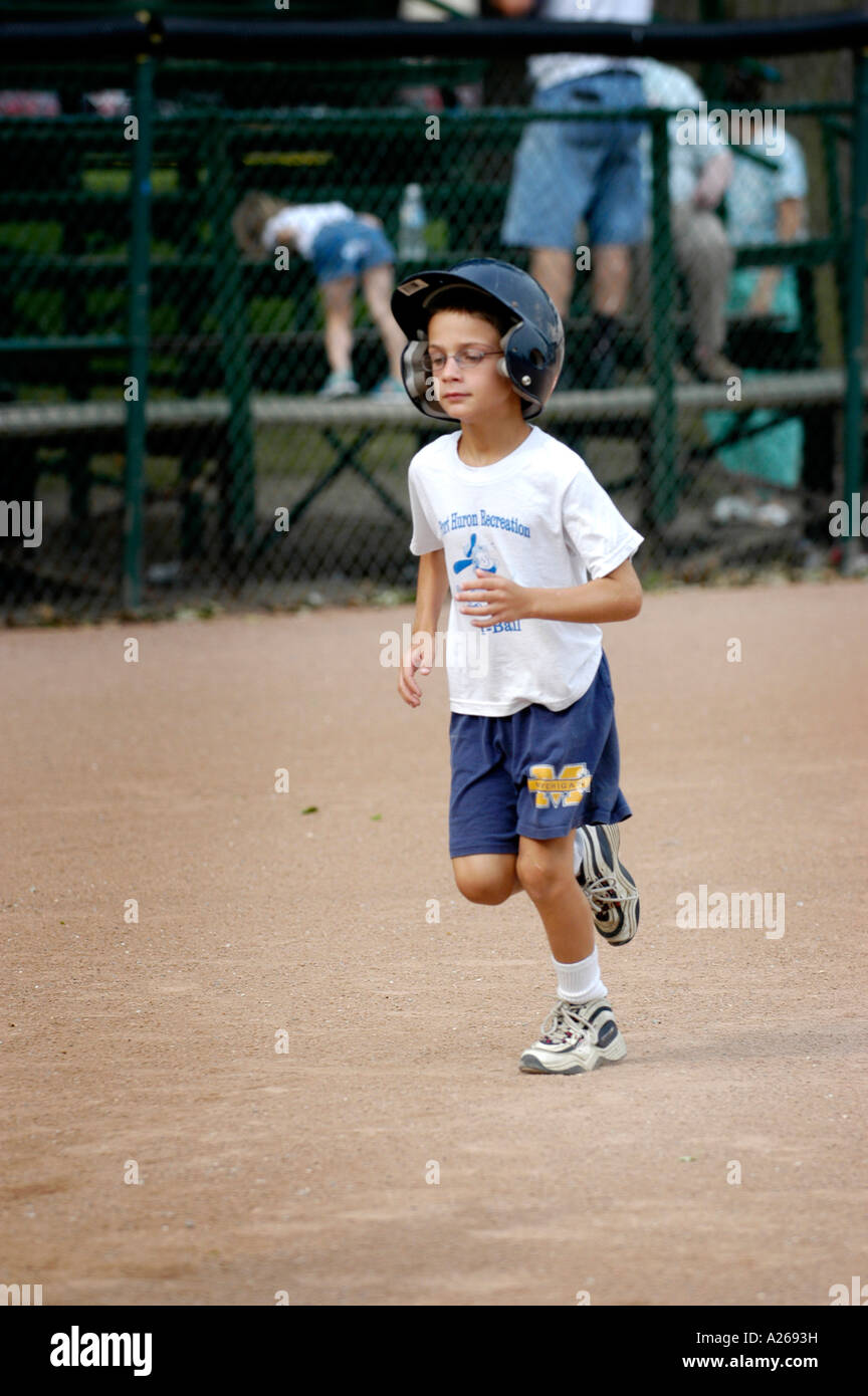 5 to 7 year old boys and girls taken baseball lessons by being ...