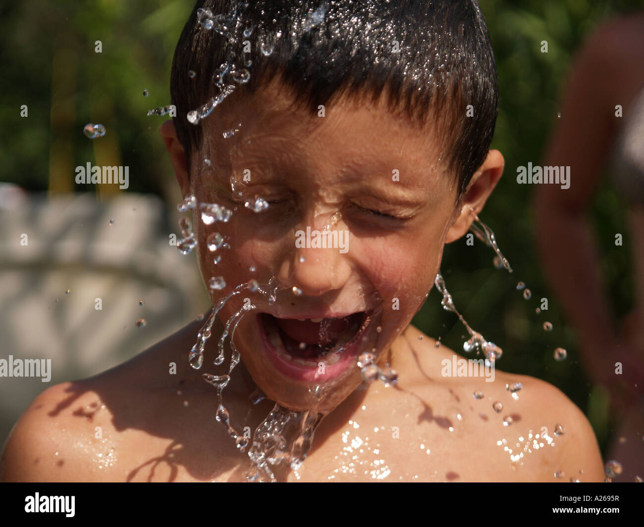 Drenched boy hi-res stock photography and images - Alamy