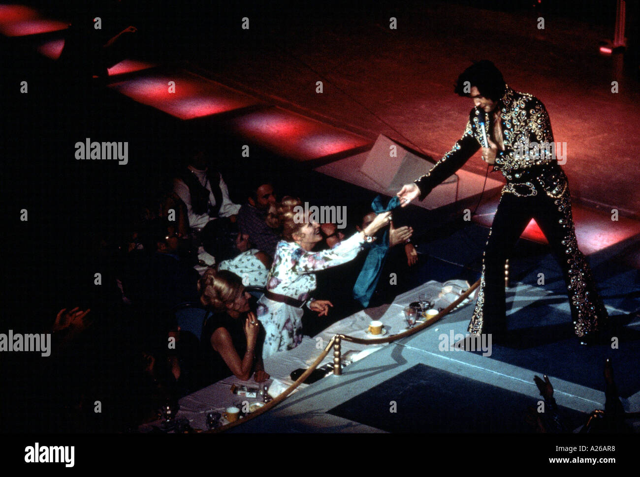 Elvis presley on stage hi-res stock photography and images - Alamy