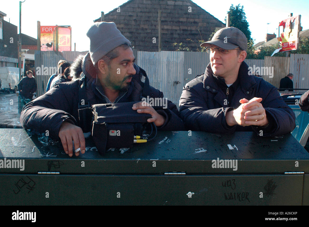 Neil Biswas and Nick Brown on set of Bradford Riots Stock Photo - Alamy
