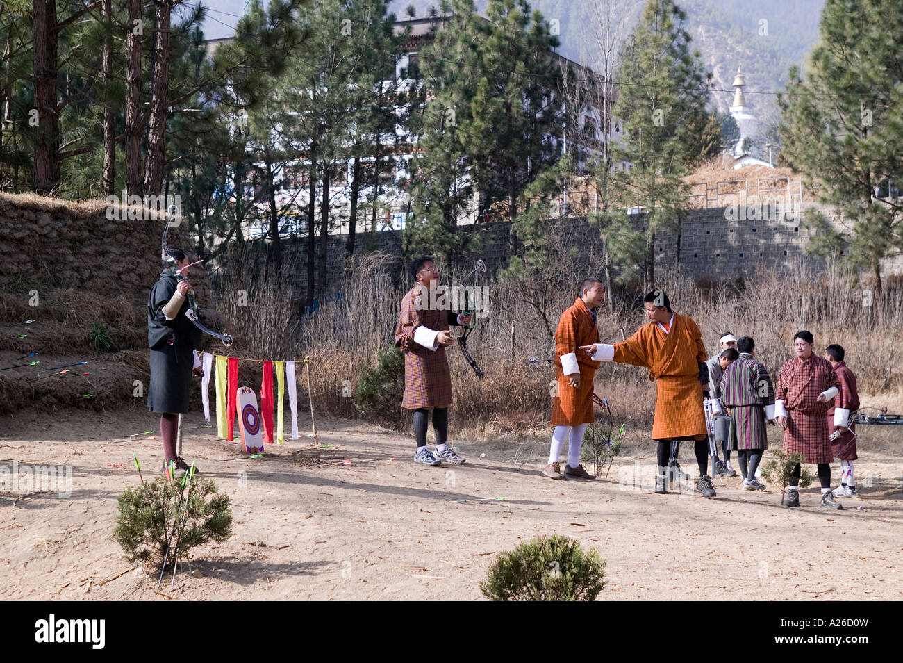 Men play a game of archery the national sport in Thimpu Bhutan Stock ...