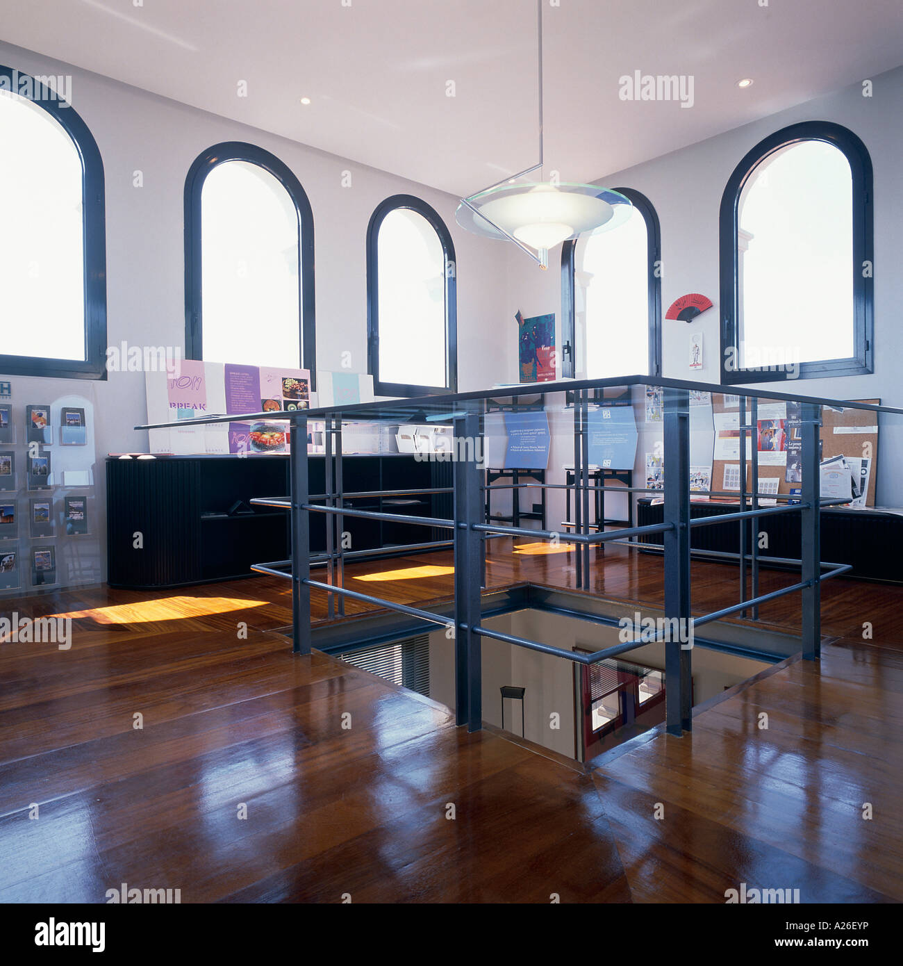 View of posters on display in a large room Stock Photo - Alamy