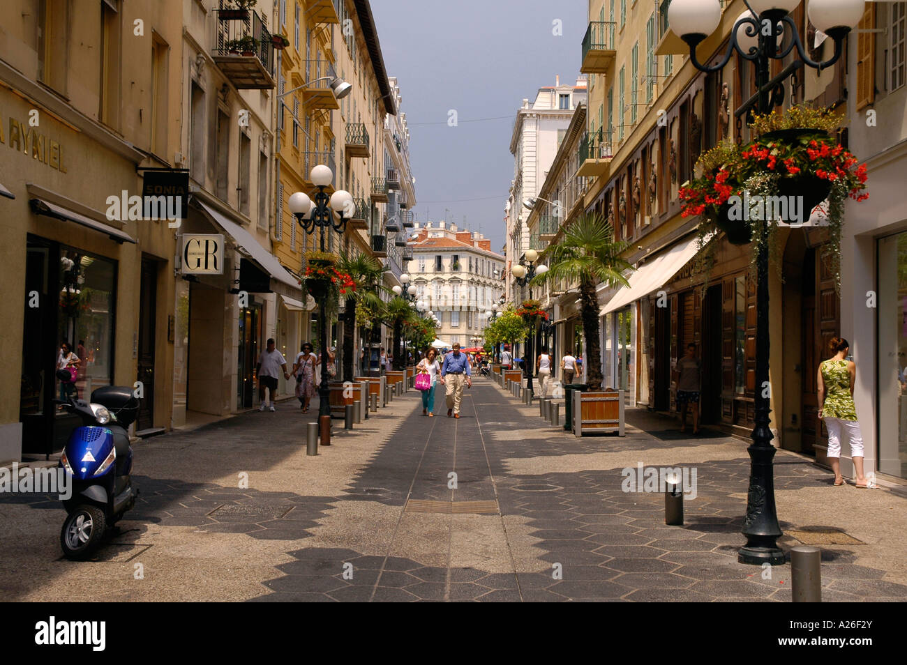 Pedestrian street scene with walking people in old town center Stock ...