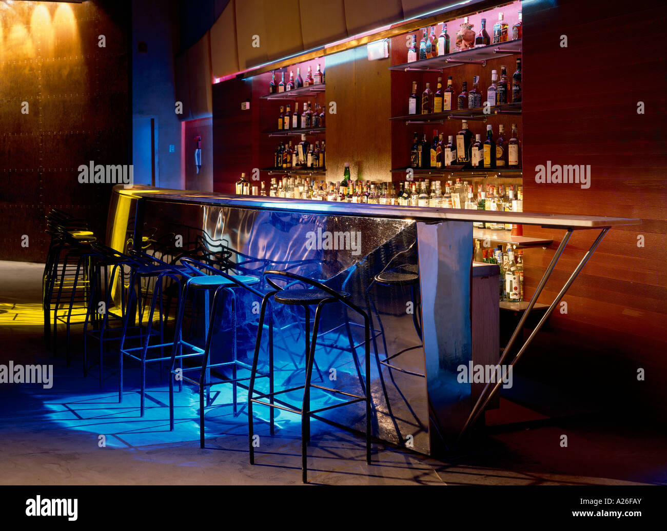 View of a bar counter with colorful lighting Stock Photo - Alamy
