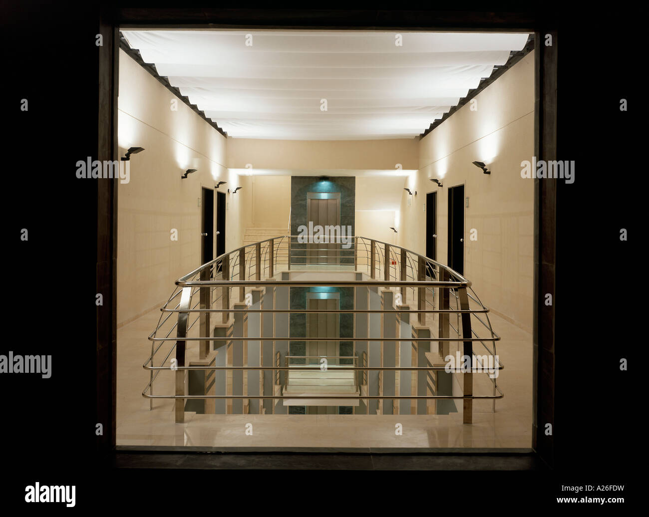 View of a corridor with a metallic railing Stock Photo - Alamy