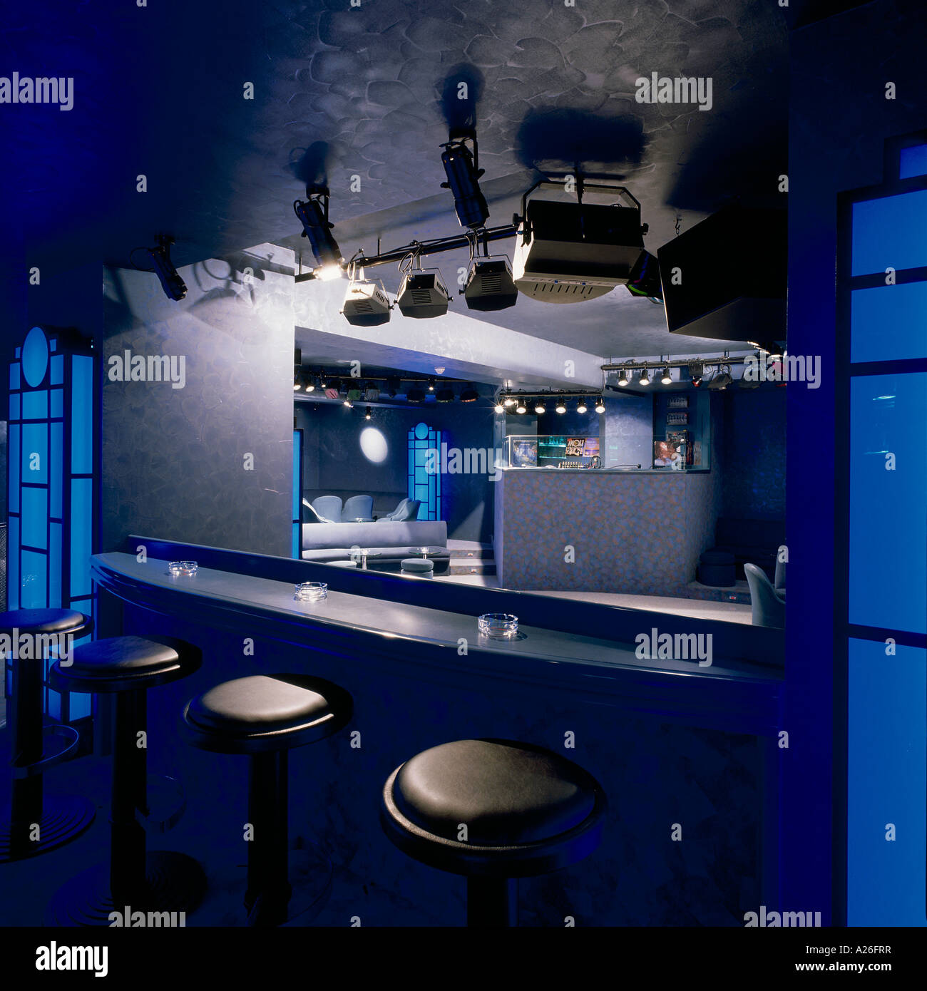 View of stools arranged in a bar Stock Photo - Alamy