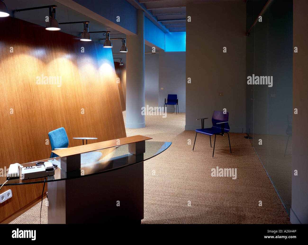 View of a reception counter inside an eclectic office Stock Photo - Alamy