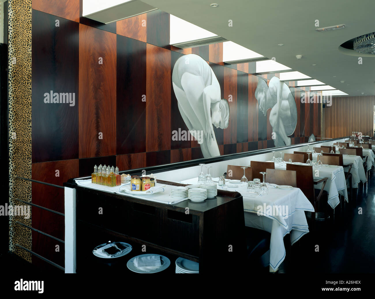View of arranged dining tables in a restaurant Stock Photo - Alamy