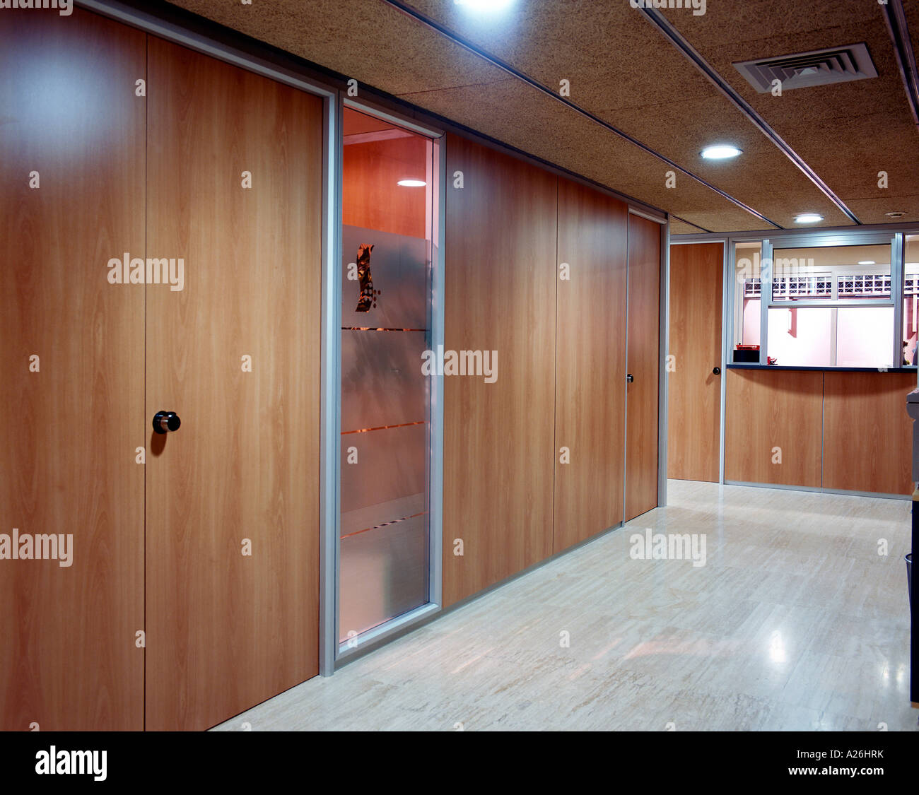 View of an eclectic hallway inside an office building Stock Photo - Alamy